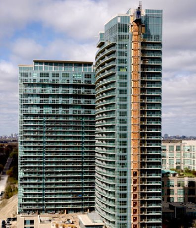 Glass work reaches the top floor on California condos in Toronto